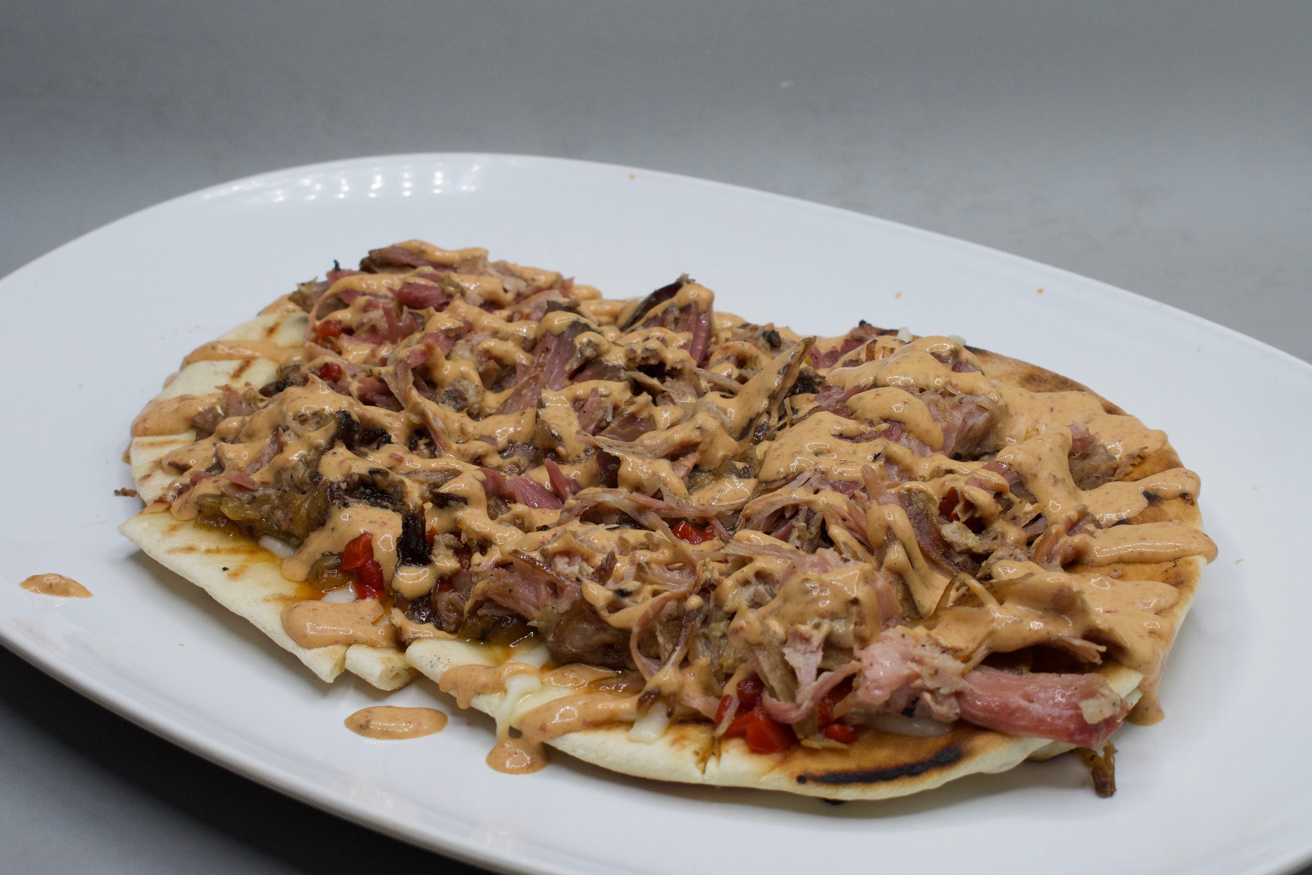 Chipotle Pork Flatbread | Ugly Graffiti Downtown